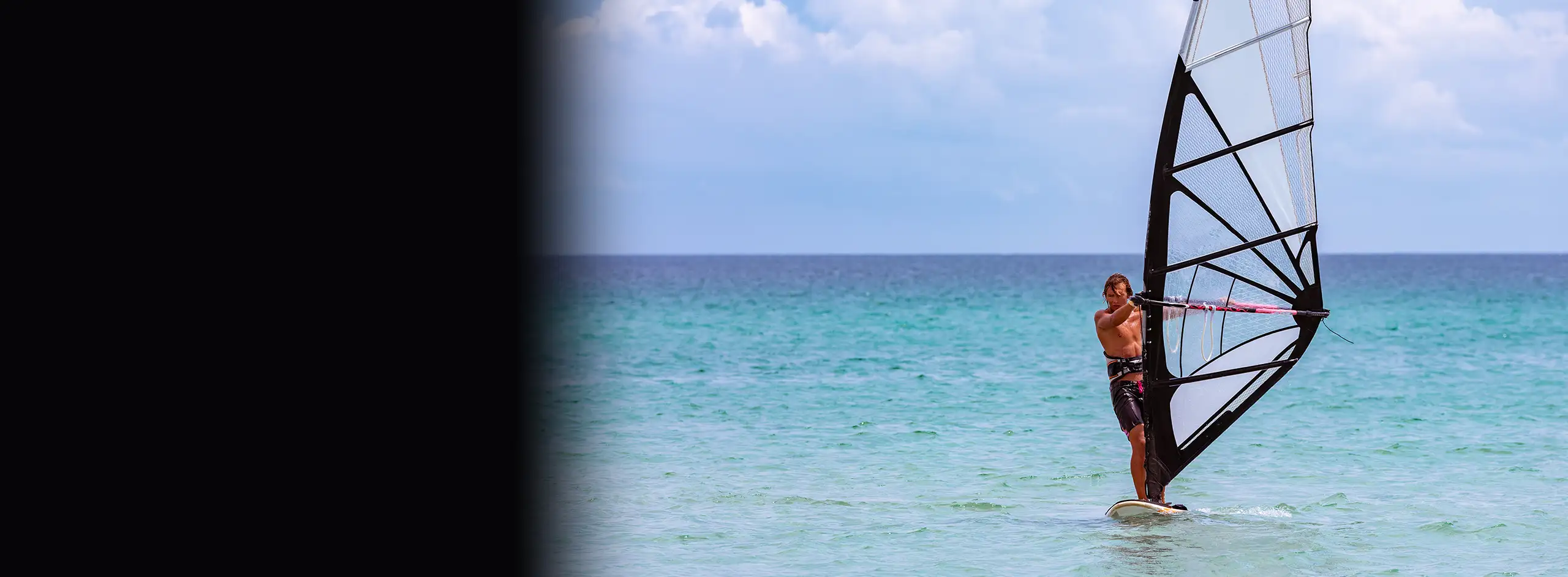 Ride the Waves with Windsurfing - Fantasia Water Sports